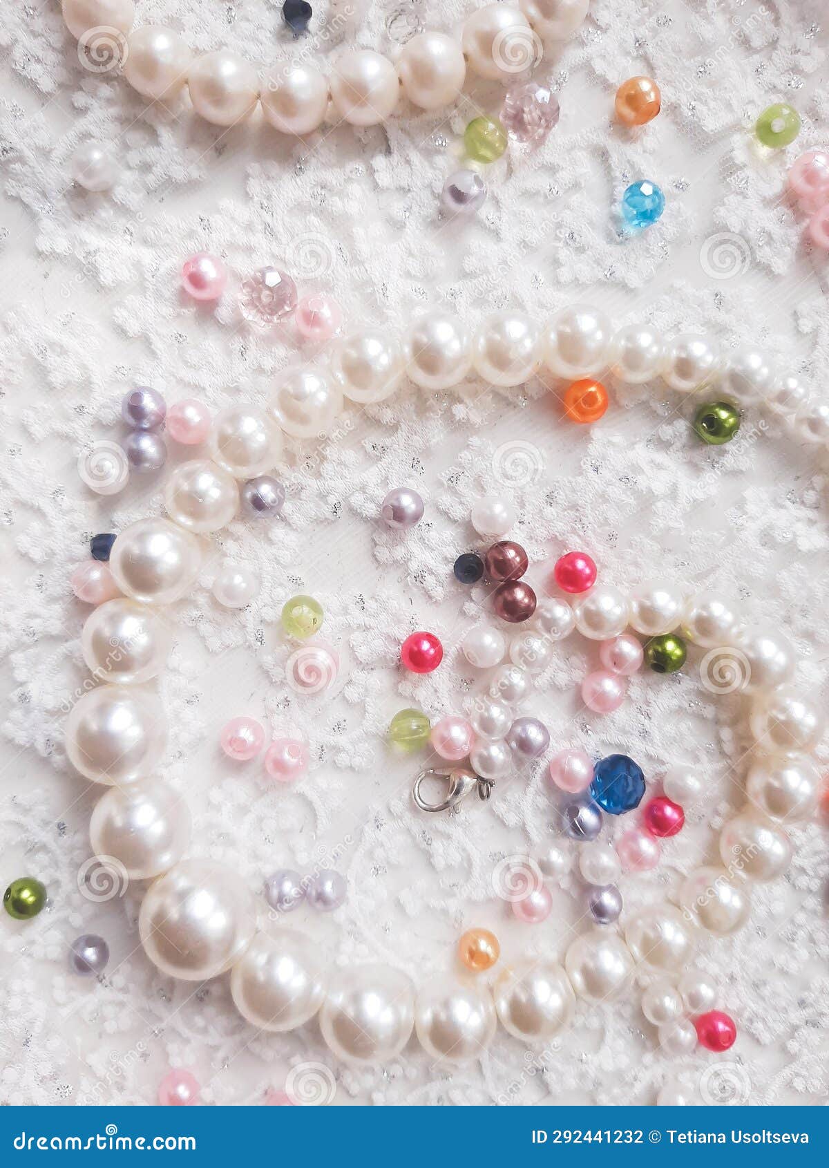 Texture of Pearl Thread with Colored Beads on a White Background Stock ...