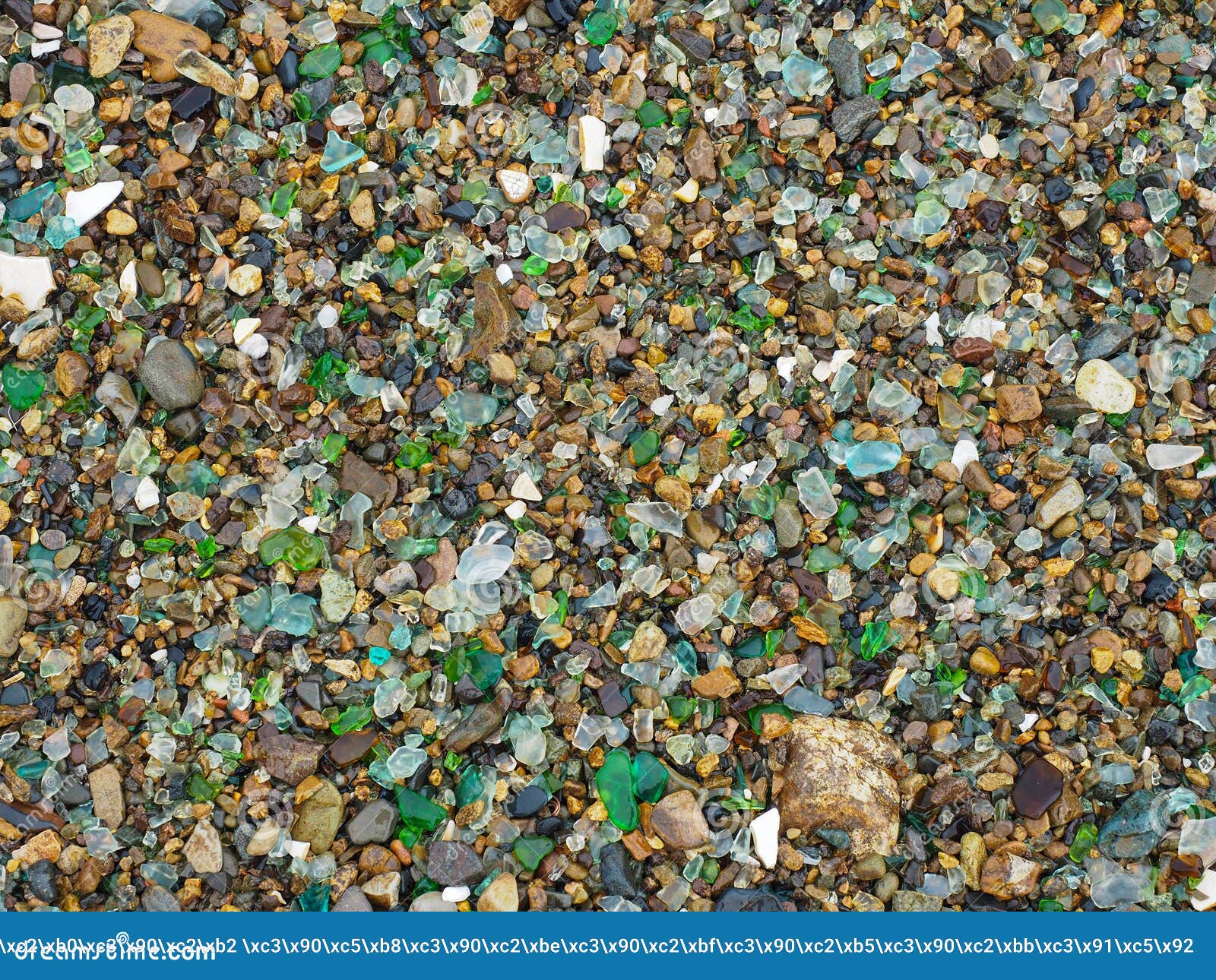 The Texture of a Stone Beach with Many Pieces of Colored Glass Stock ...