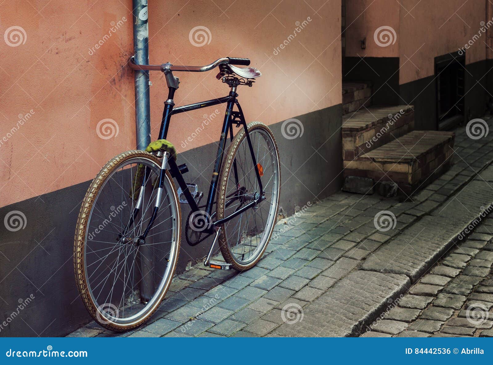 Texture of Stone and Cobblestone, Bicycle on a City Street Stock Photo ...