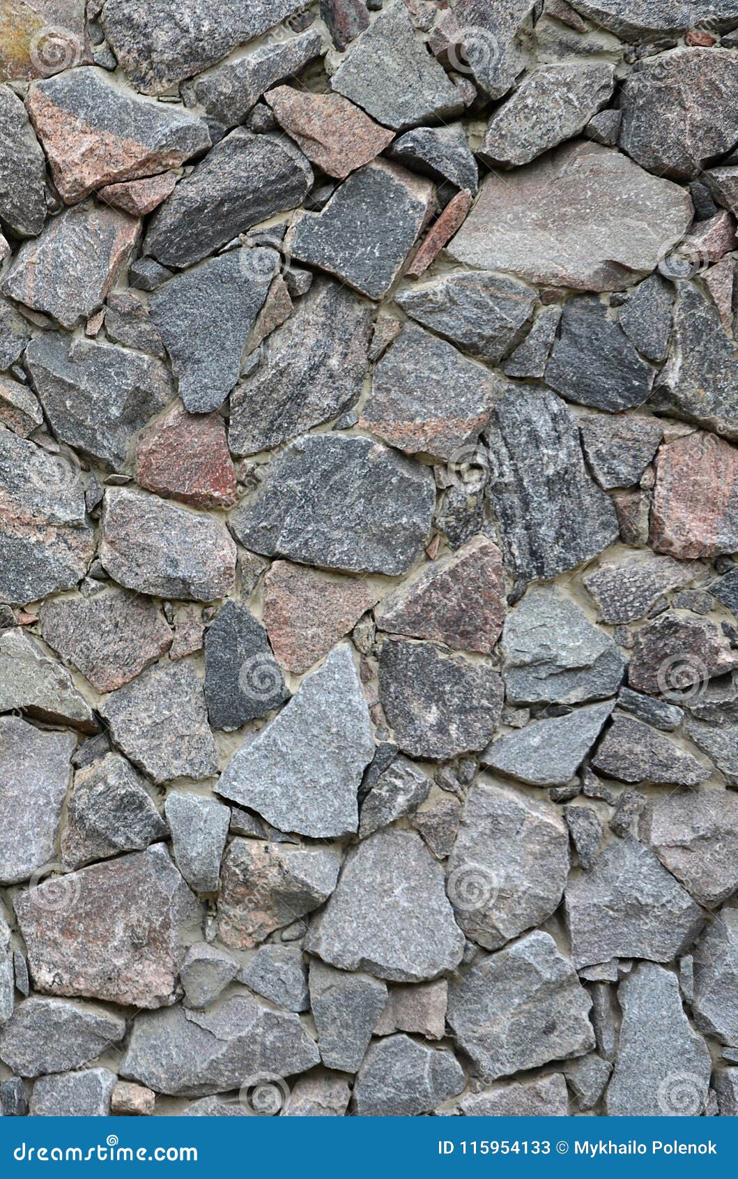 The Texture of a Strong Stone Wall of Many Concreted Stones of Various ...
