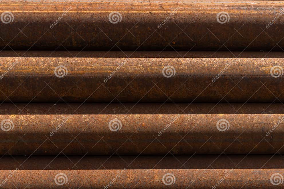 The Texture of the Surface of Rusty Metal Pipes, Background. Stock ...