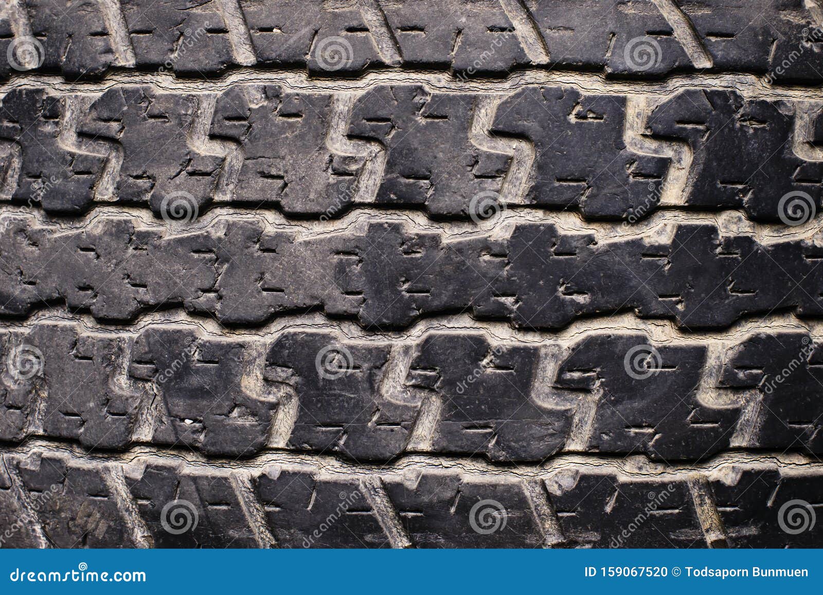 The Texture of the Used Rubber Tire. Car Tire Tread Pattern Stock Photo ...