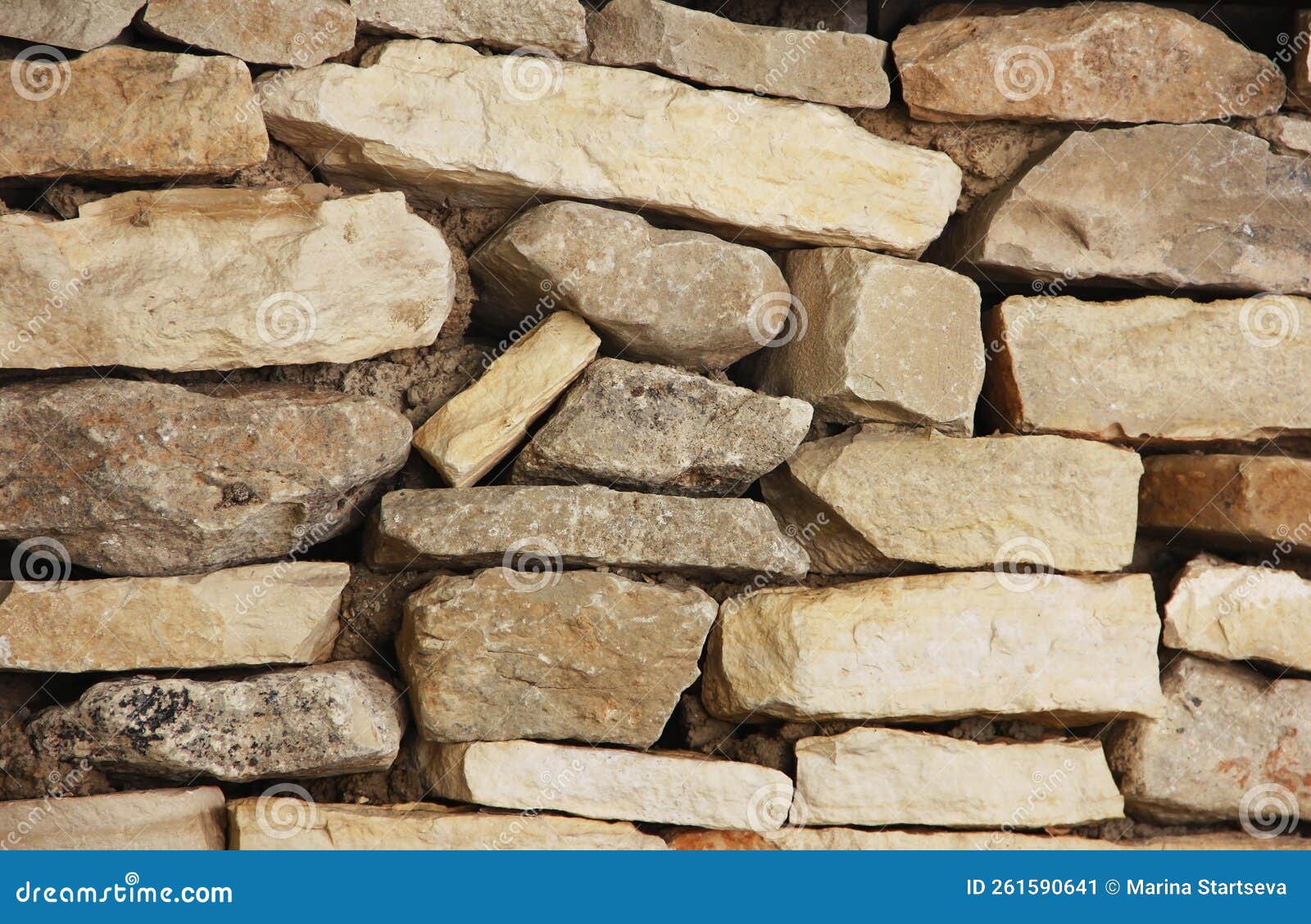 Texture of a Wall of Brown Granite Stones Stacked on Top of Each Other ...