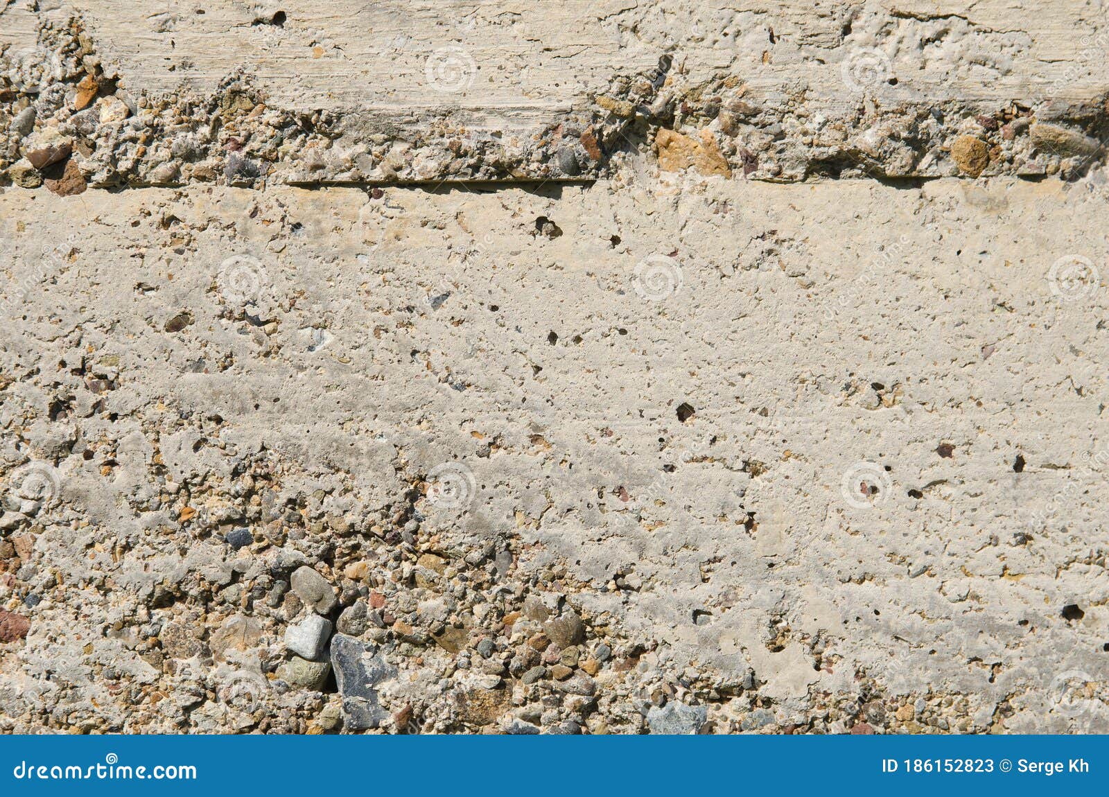 The Texture of the Wall is Cement Mixed with Small Stones. Stock Image ...