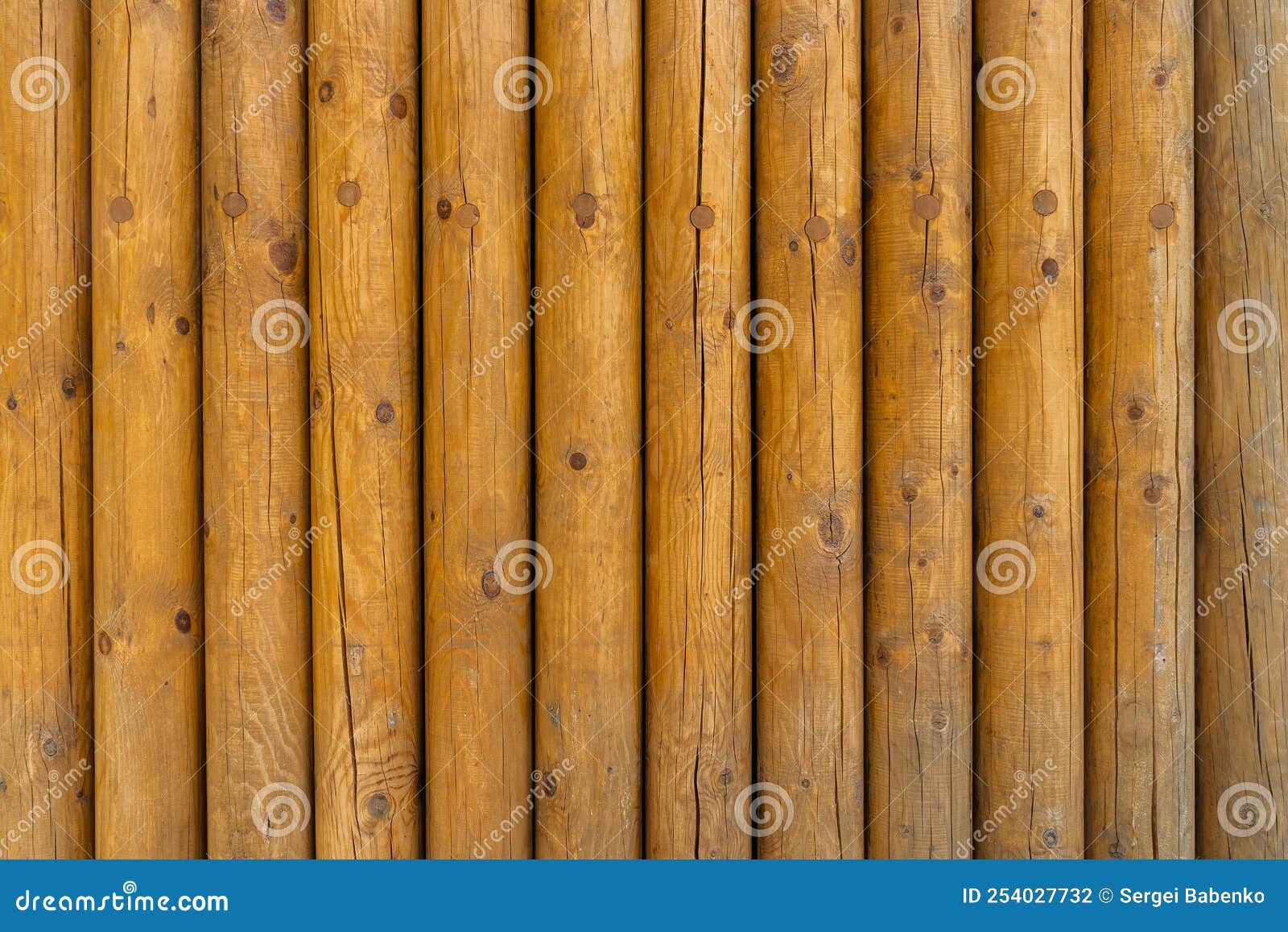 Texture or Wall Made of Cylindrical Wooden Beams. Stock Photo - Image ...