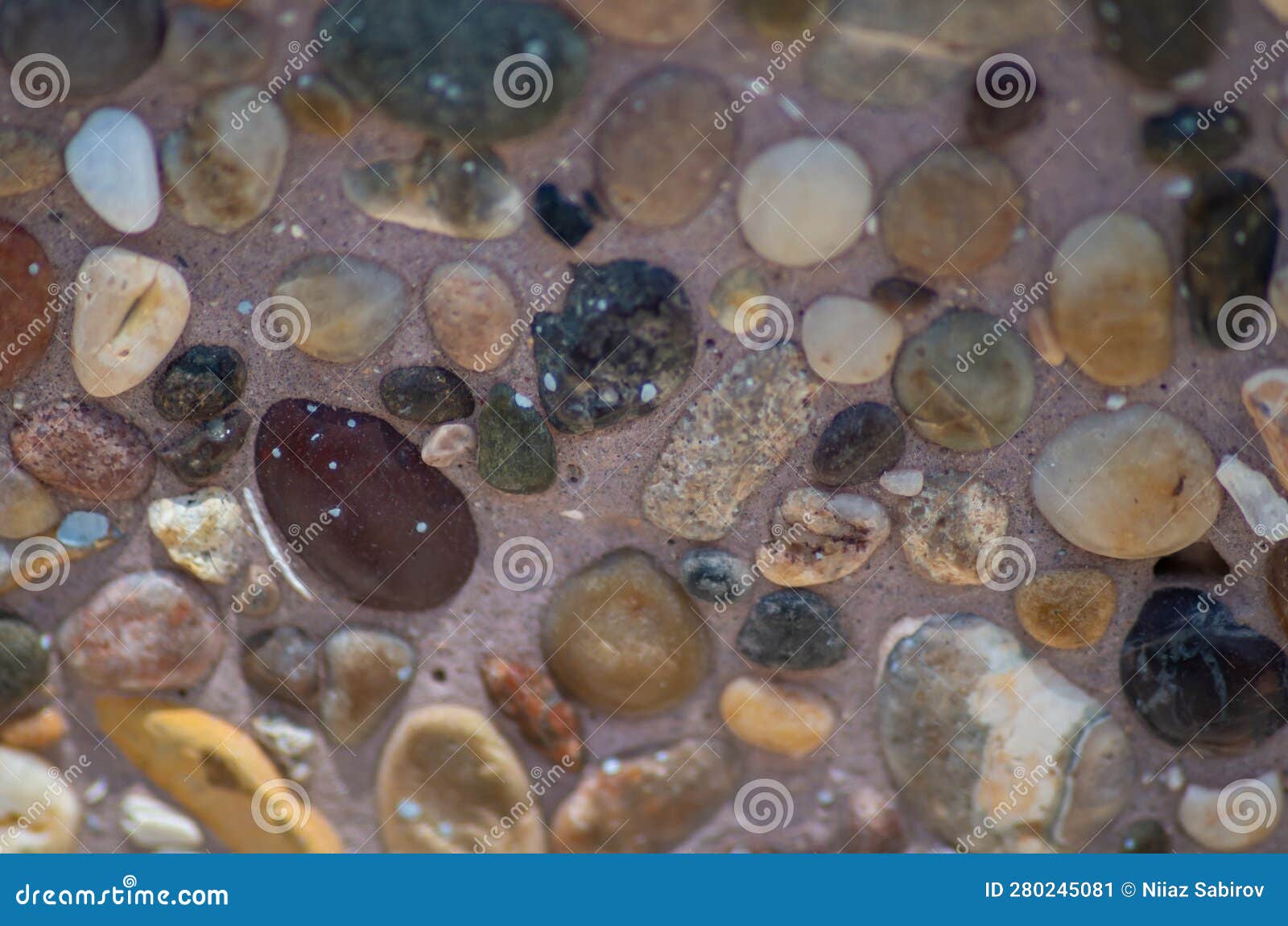The Texture of the Wall with Multi-colored Stones of Different Sizes ...