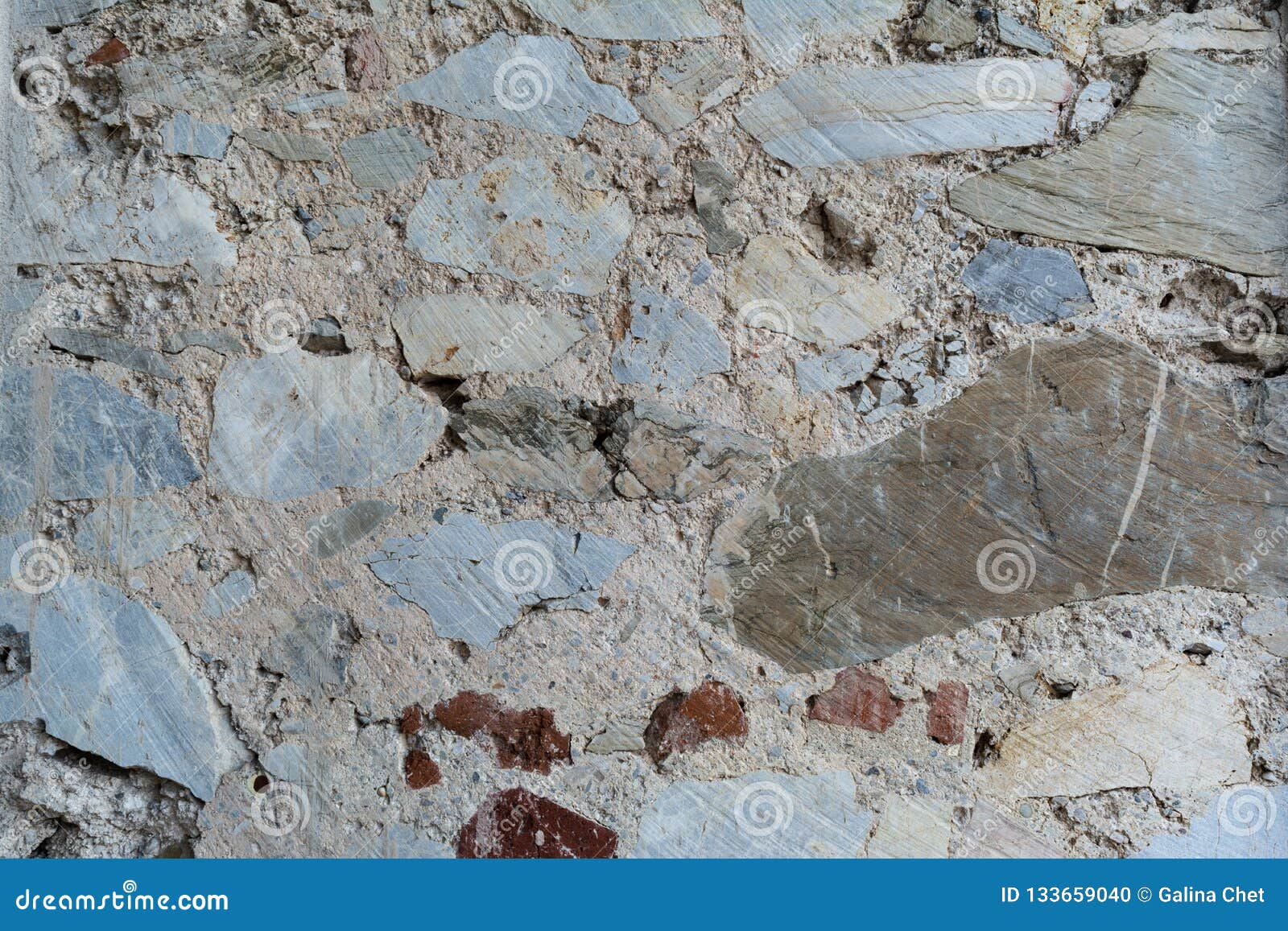 The Texture of the Wall with Various Patches of Marble, Granite, Brick ...