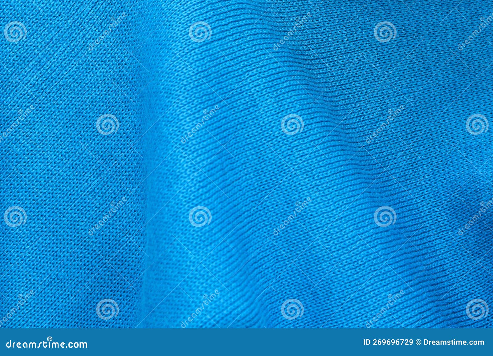 Texture of a Wavy Surface of a Blue Knitted Woolen Fabric Stock Image ...
