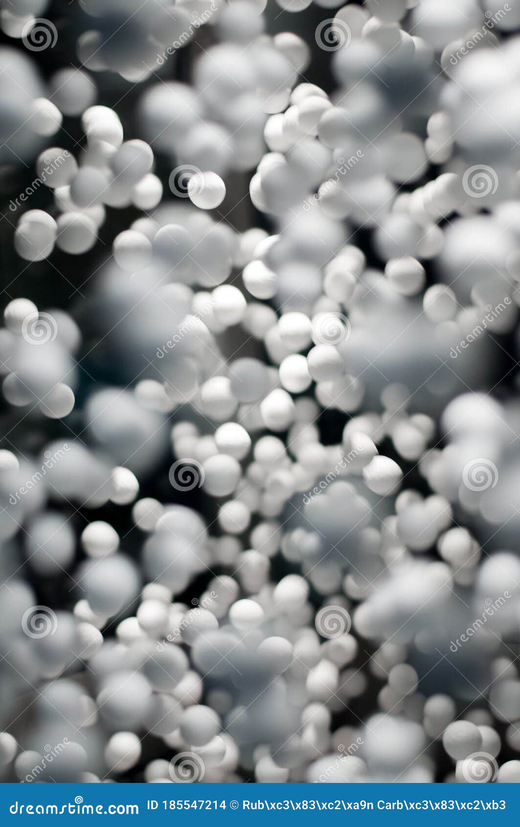 Texture of White Balls Floating Over a Dark Background Stock Photo ...