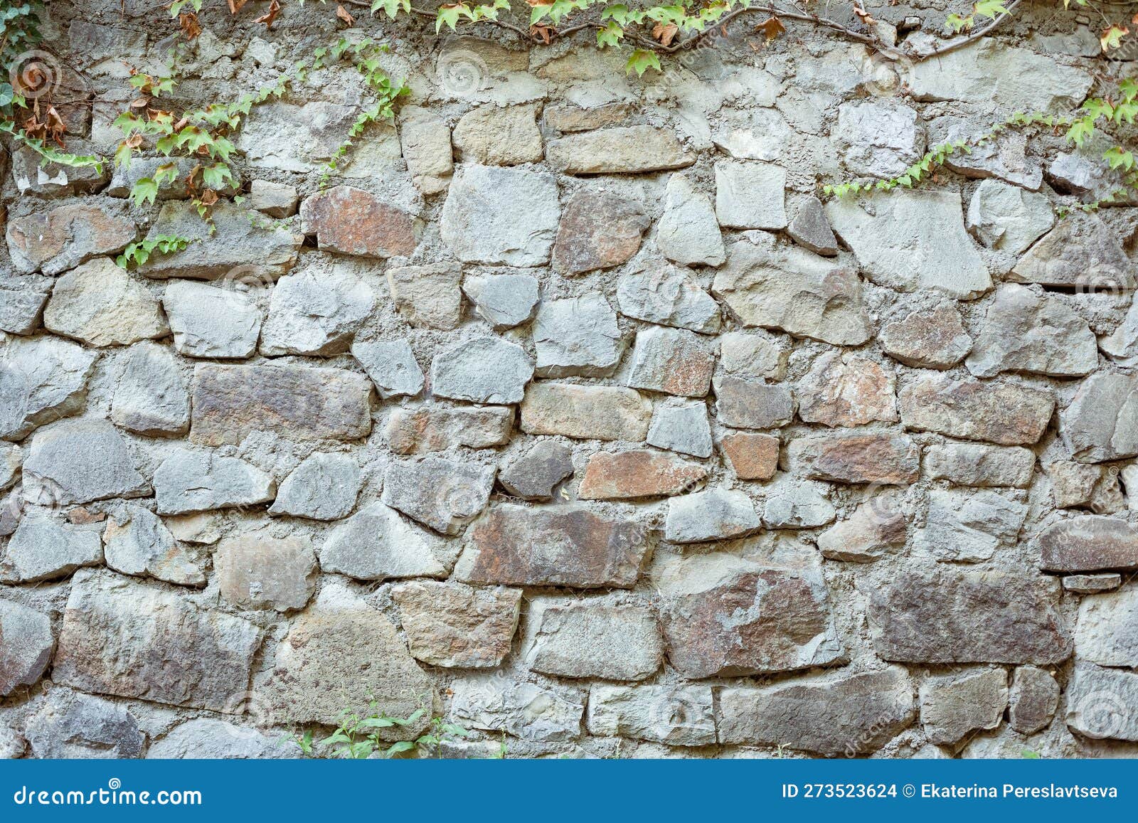 Background Of Irregular Rounded Cobblestones Of Gray And Brown Color On ...