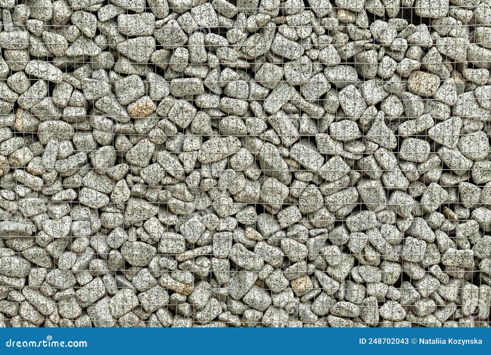 Textured Background of a Stone Wall with Iron Netting. Stone Wall in ...