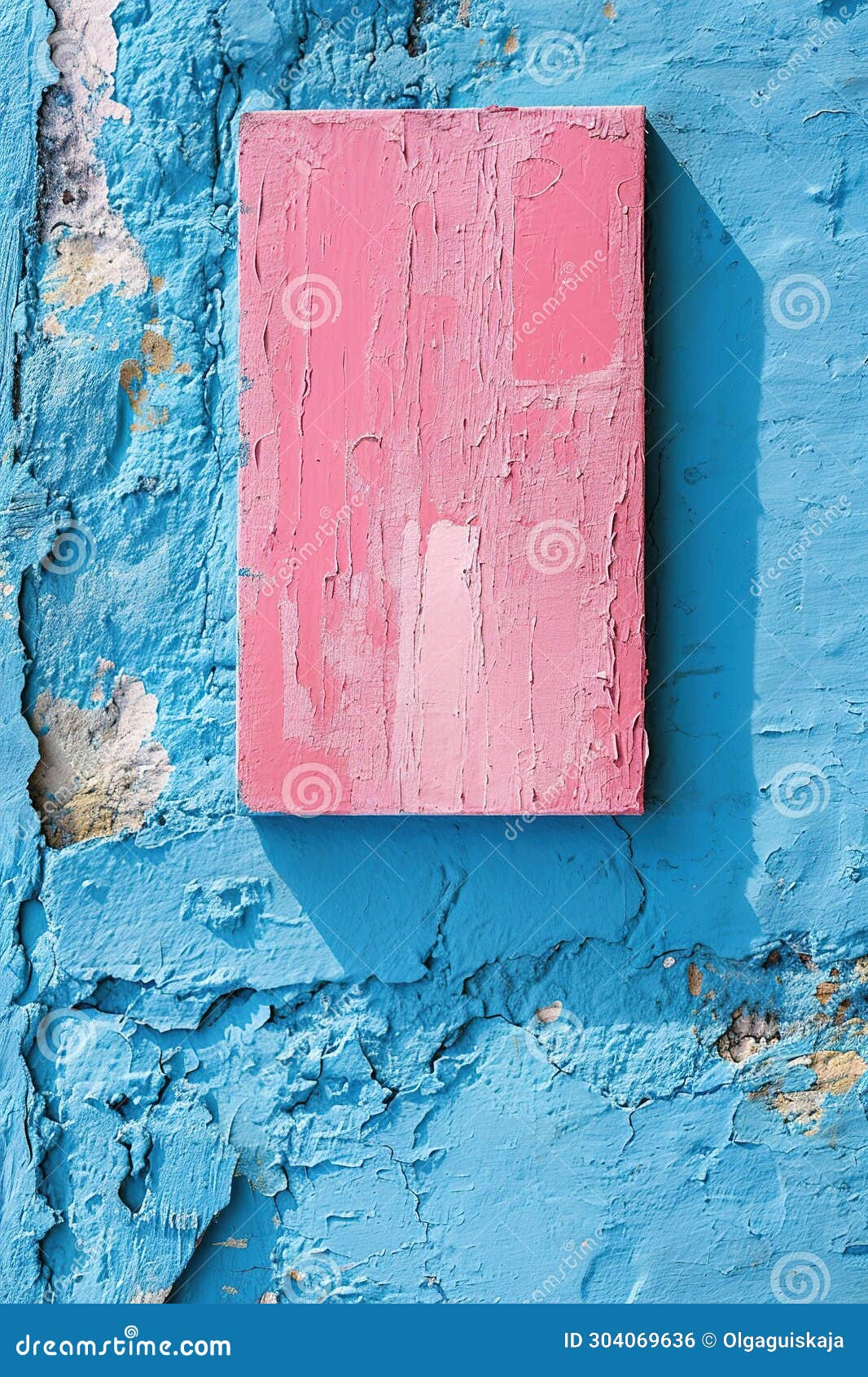 A Textured Blue Wall Featuring a Contrasting Pink Rectangular Paint ...