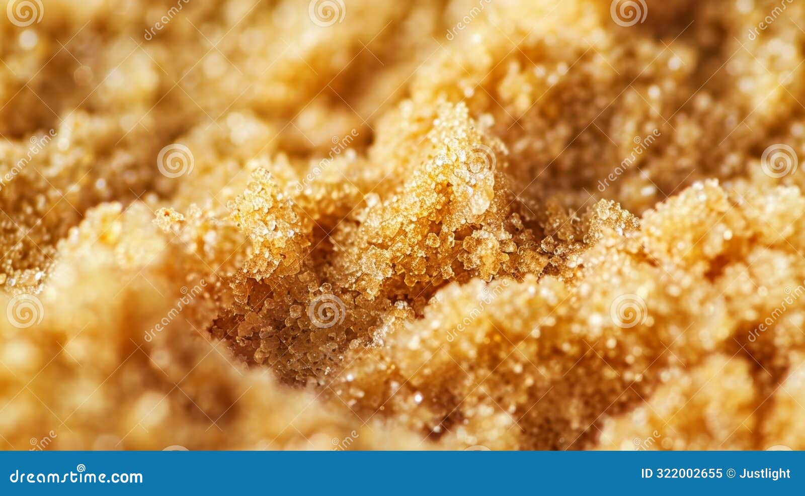 A Textured Image of Light Brown Raw Sugar with Visible Specks of ...