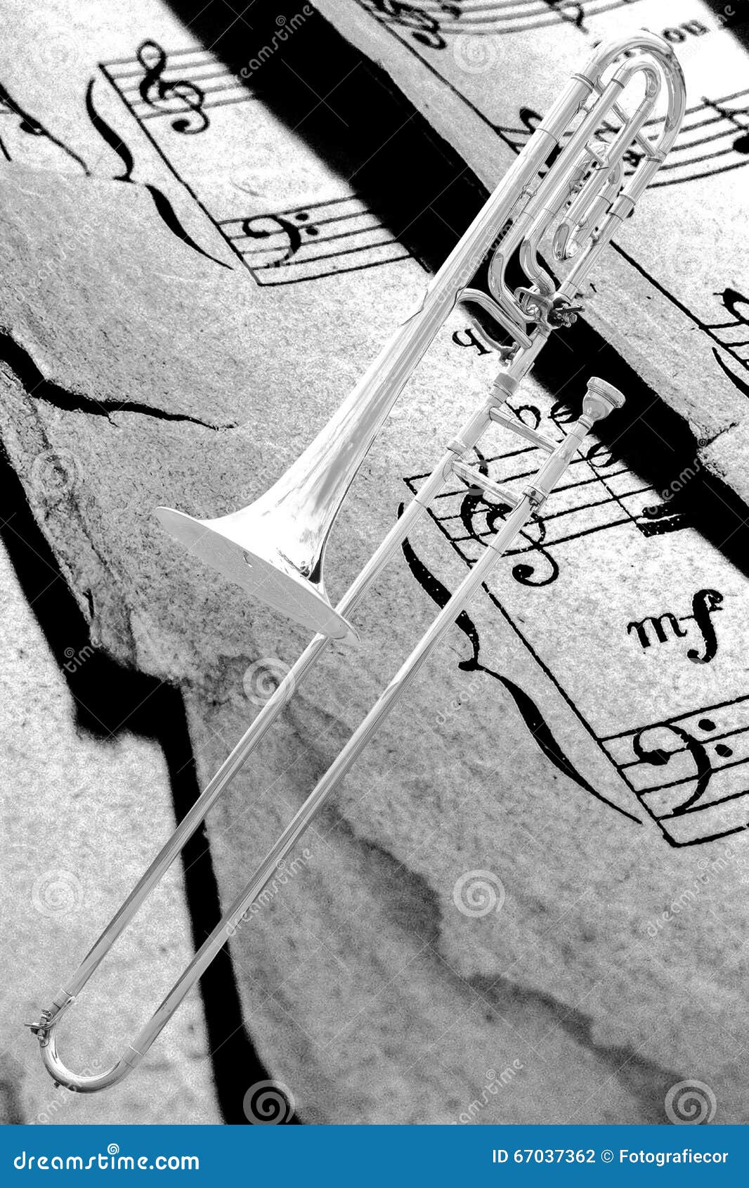 Textured Musicpaper Background with Silver Trombone Stock Photo - Image ...