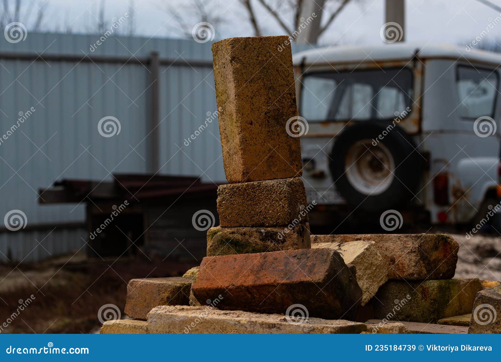 Textured Refractory Brick Standing on a Pile of Bricks. Stock Image ...