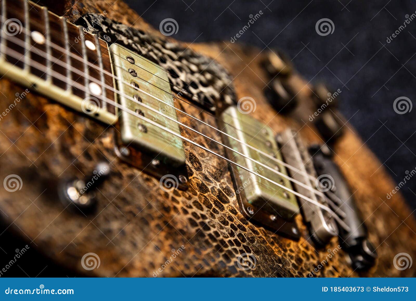 A Textured Rustic Guitar stock image. Image of music - 185403673