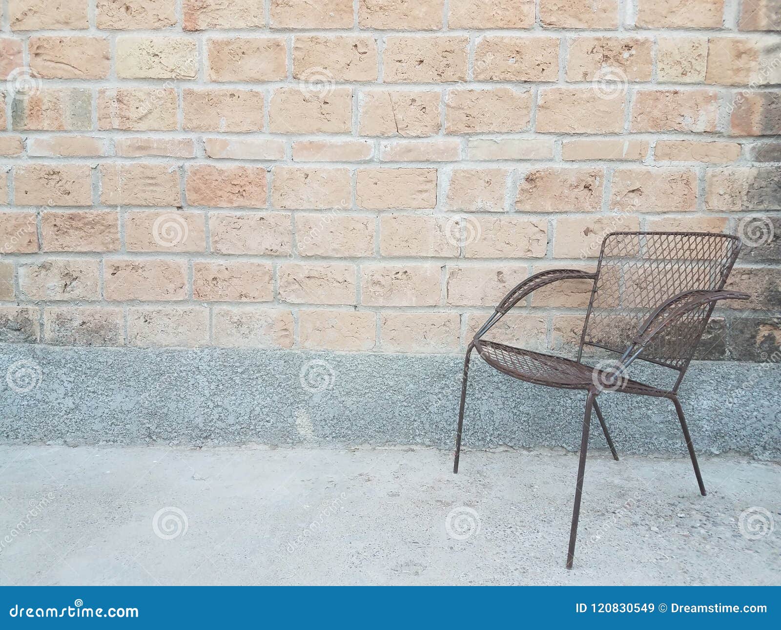 A Chair in a Good Brick Mural. Stock Image - Image of nostalgic, relax ...