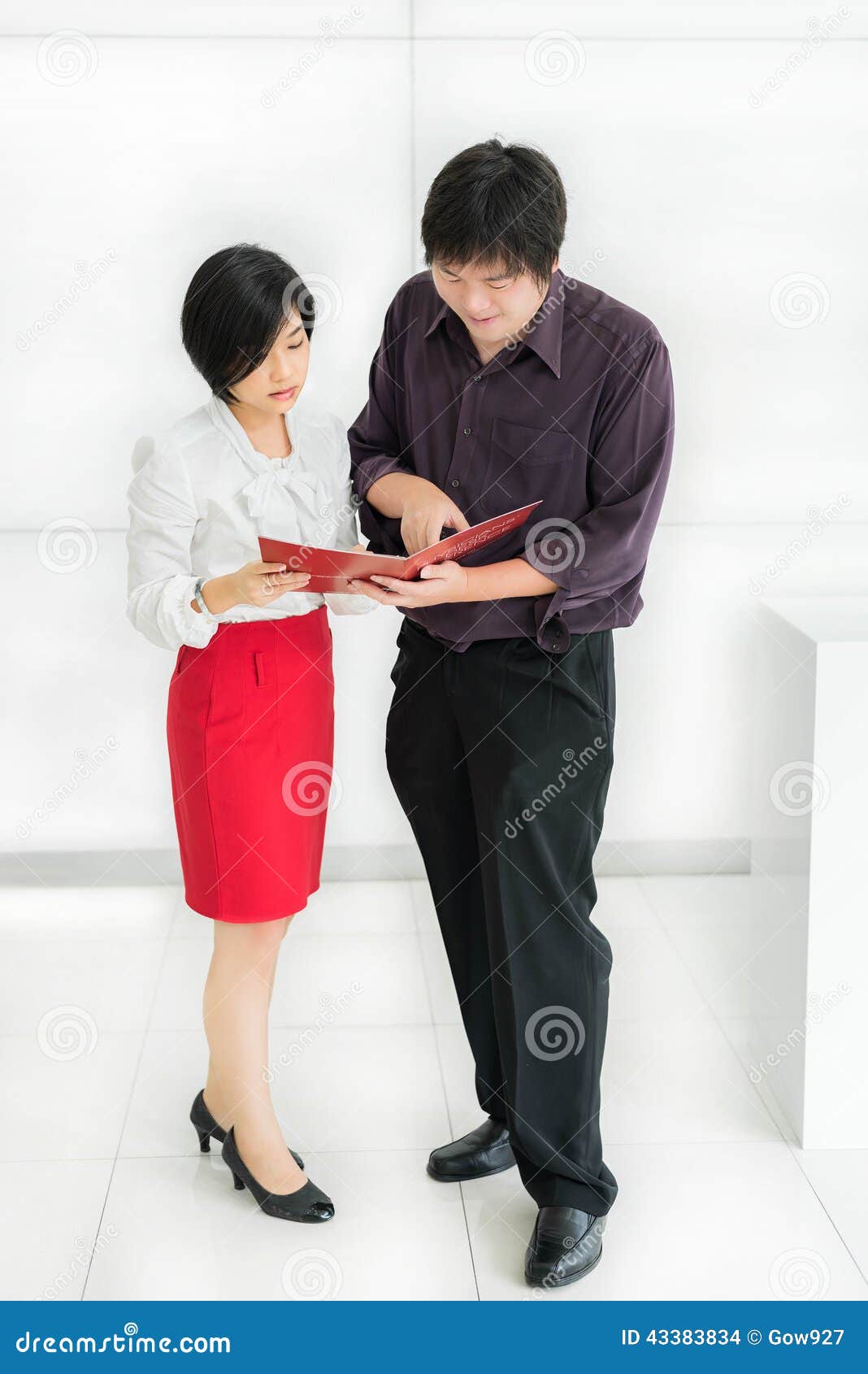 Thai (Asian) Boss is Ordering a Task for His Secretary in the of Stock ...