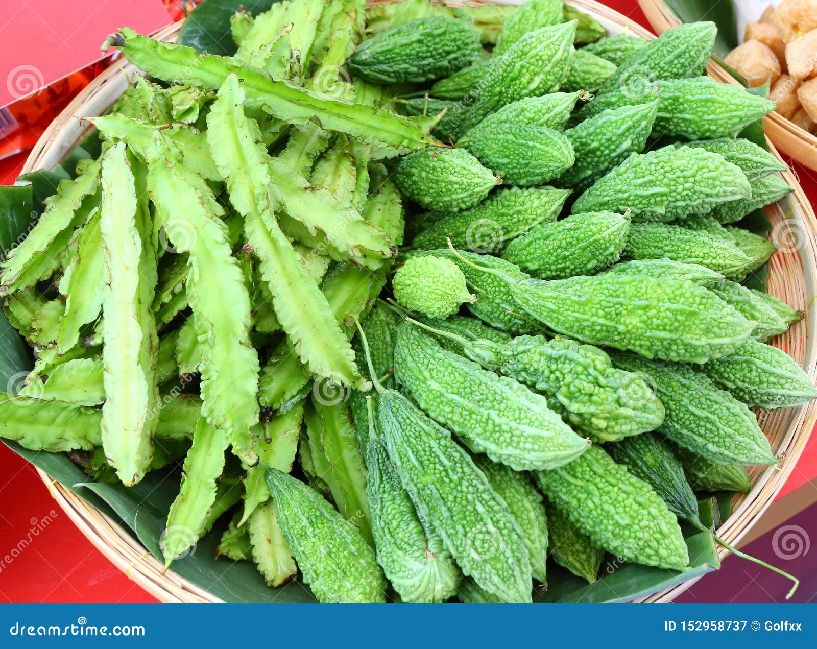Thai Bitter Gourd and Wing Bean in the Basket Stock Image - Image of ...