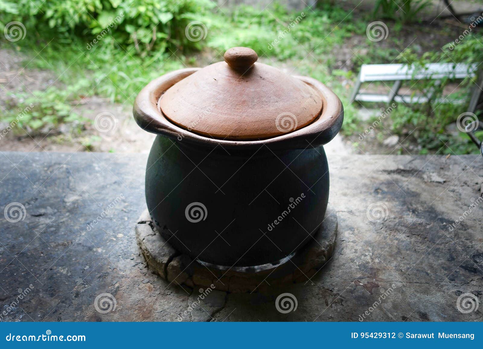 Thai clay pot on fire stock photo. Image of pottery, asia - 95429312
