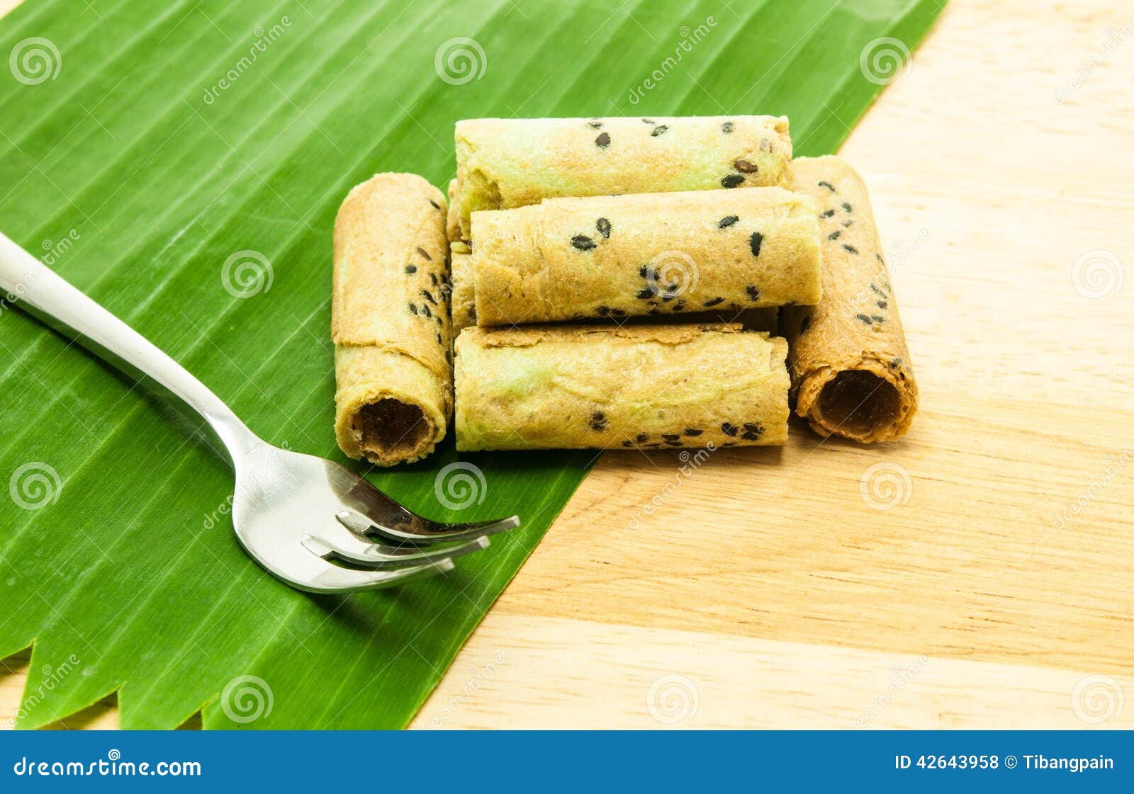 Thai Coconut Cracker Roll on Banana Leaf. Stock Photo - Image of field ...