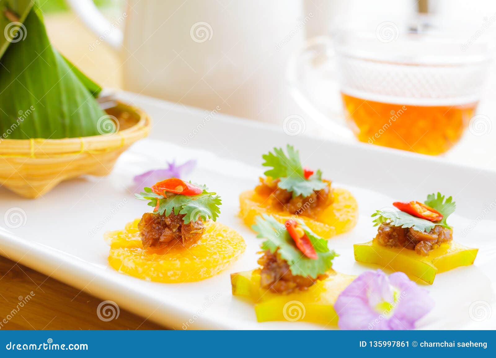 Thai Dessert Name is MA HOR on the Dish and they are on the Table Stock ...