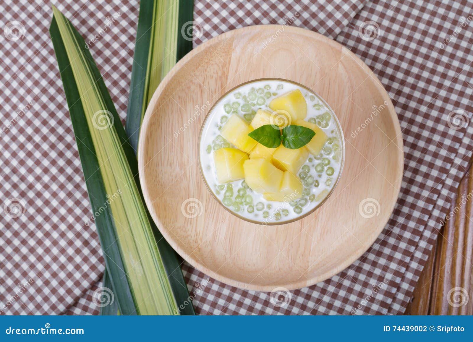 Thai Dessert of Tapioca Pearls Pudding with Mango Stock Photo - Image ...