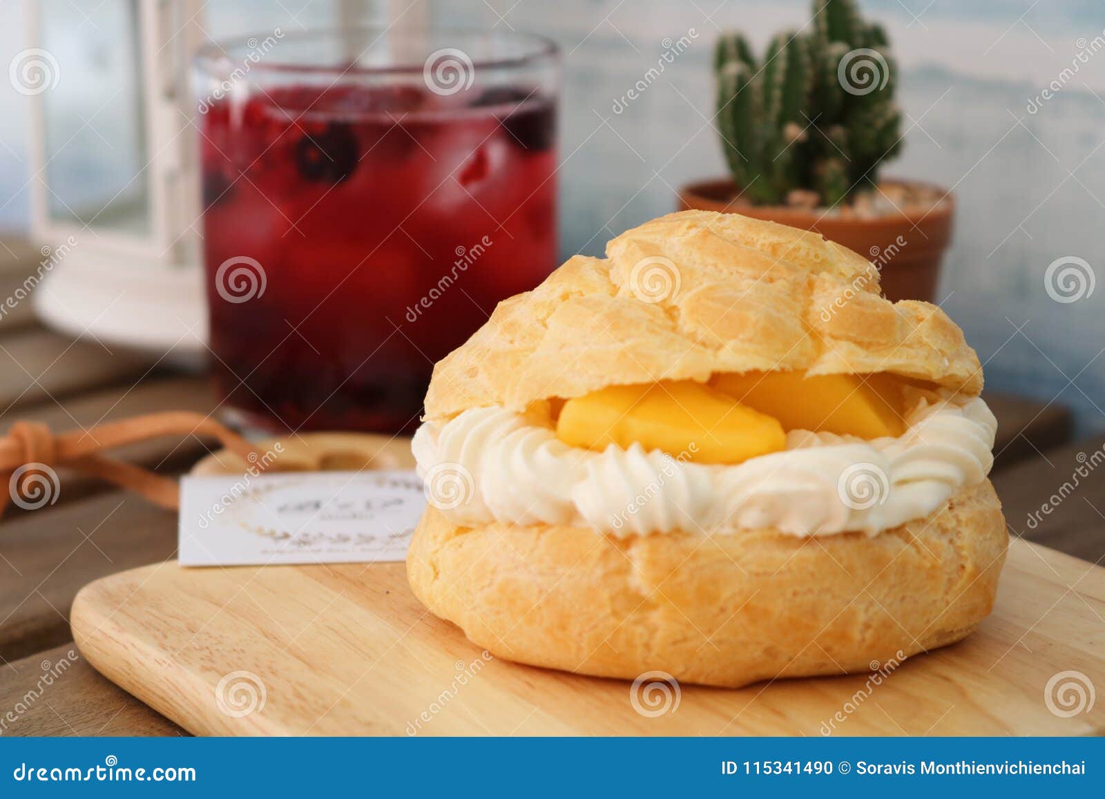 Choux cream - Mango stock photo. Image of mango, cream - 115341490