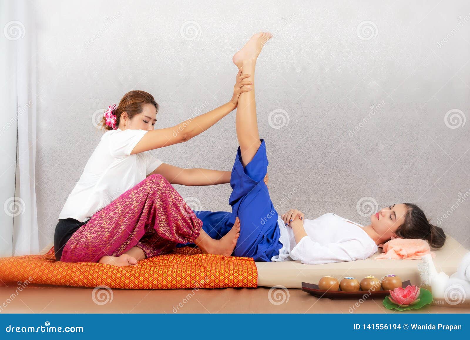 Thai Masseuse Doing Massage For Lifestyle Woman In Spa Salon Asian