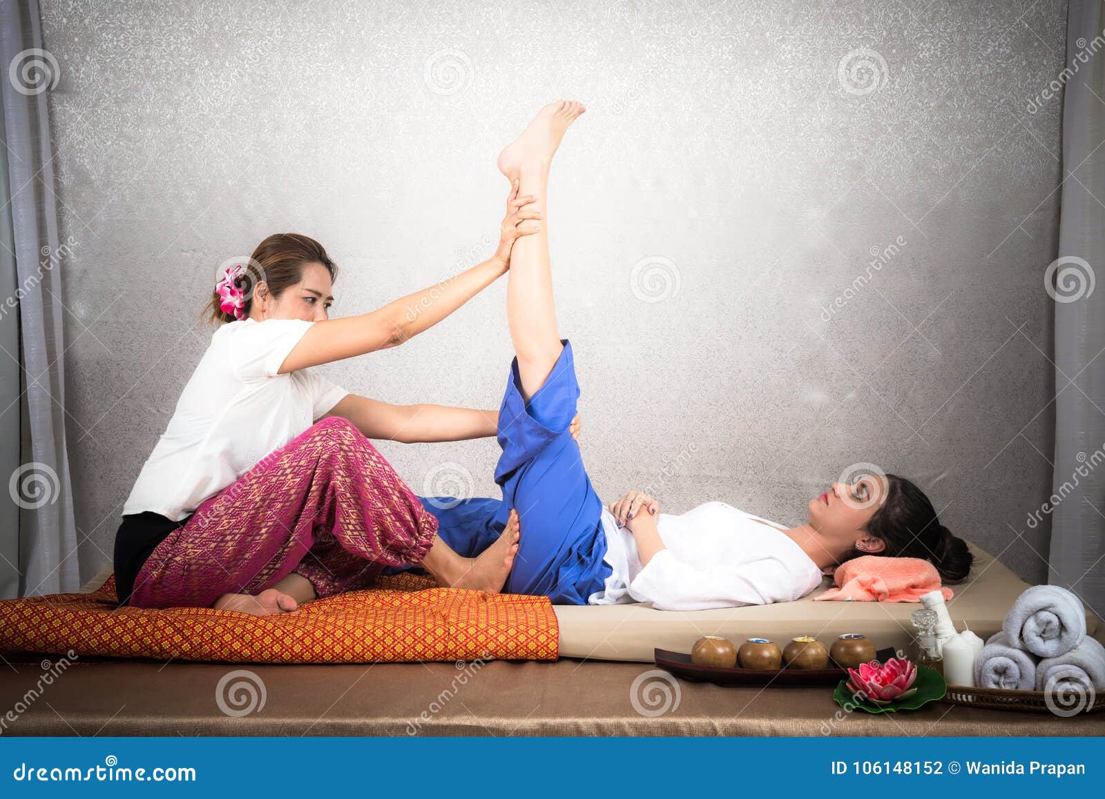 Thai Masseuse Doing Massage For Woman In Spa Salon Asian Beautiful