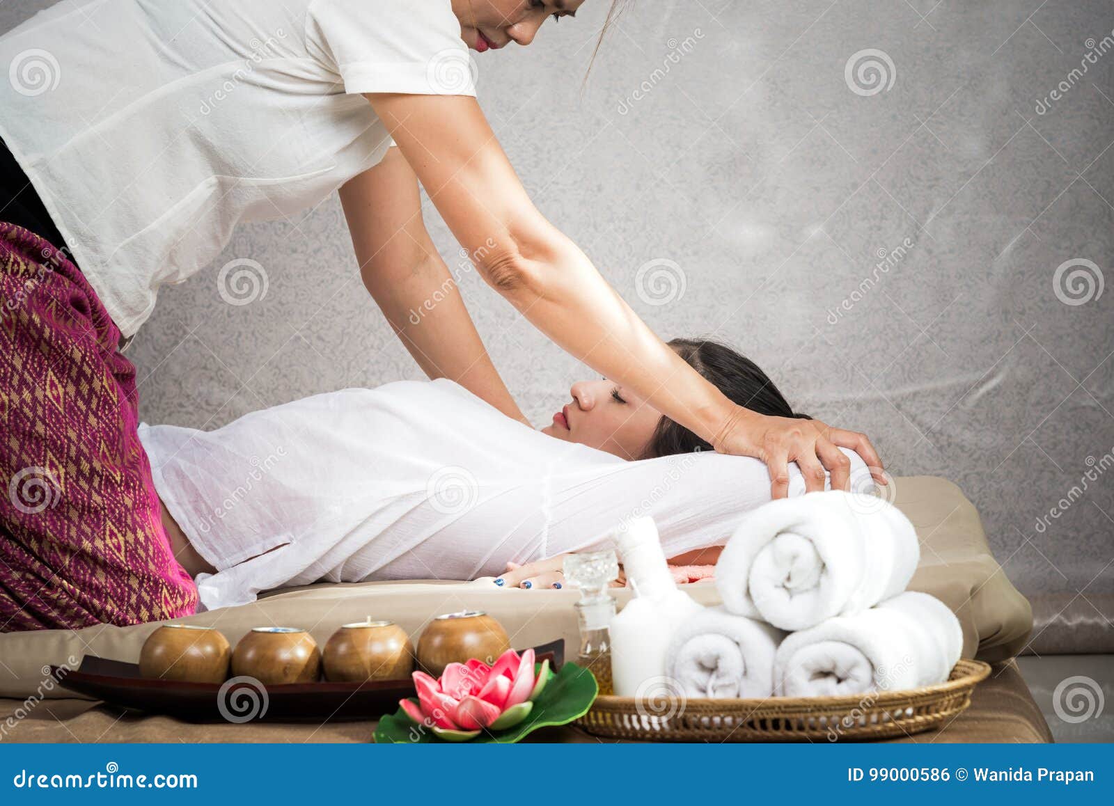 Thai Masseuse Doing Massage For Woman In Spa Salon Asian Beautiful