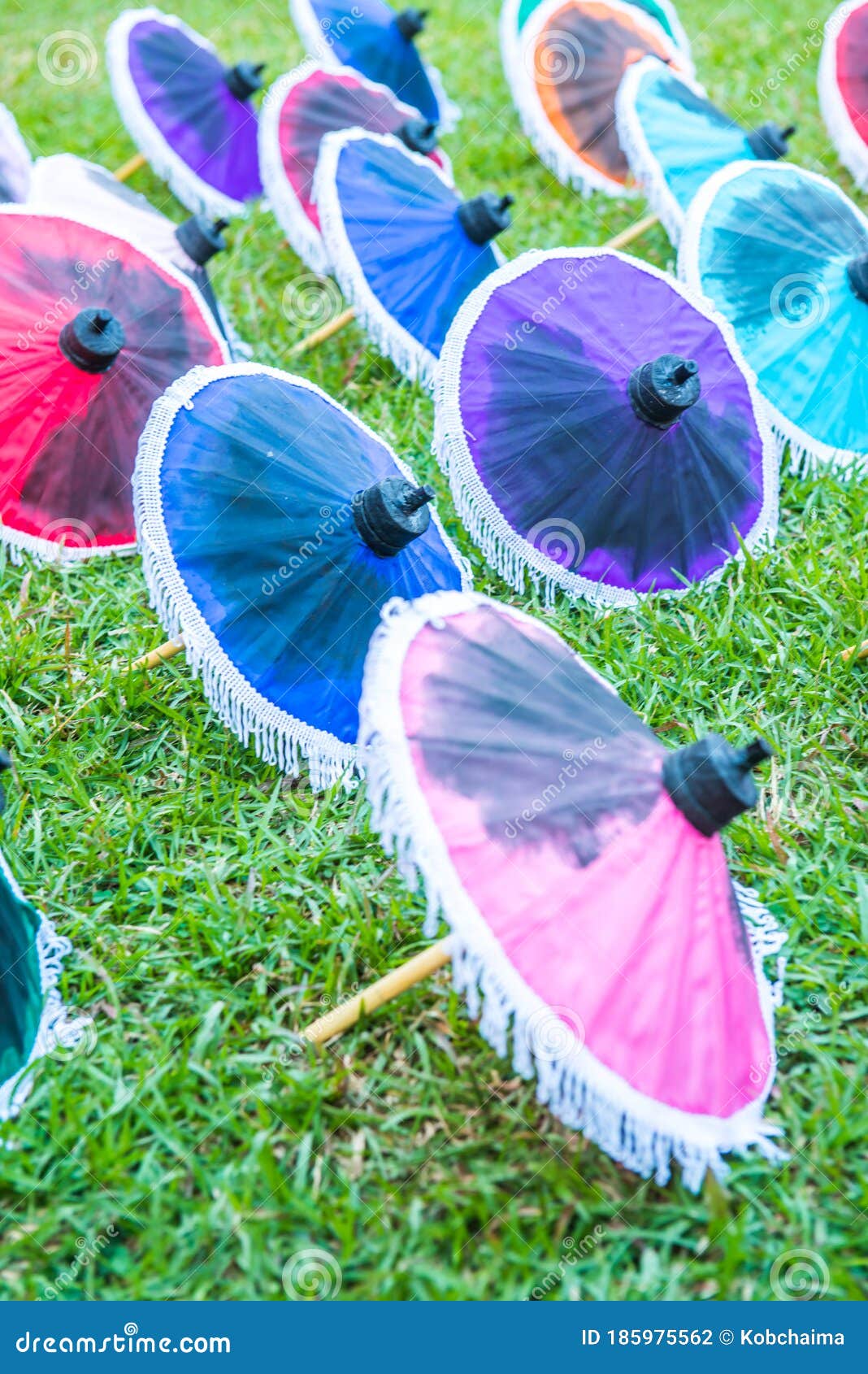 Thai Native Umbrella on Grass Stock Photo - Image of multicoloured ...