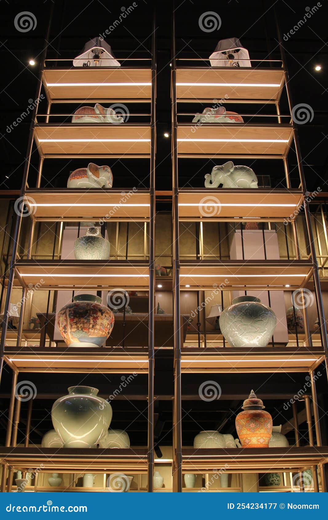 Pottery placed on shelf stock image. Image of lotus - 254234177