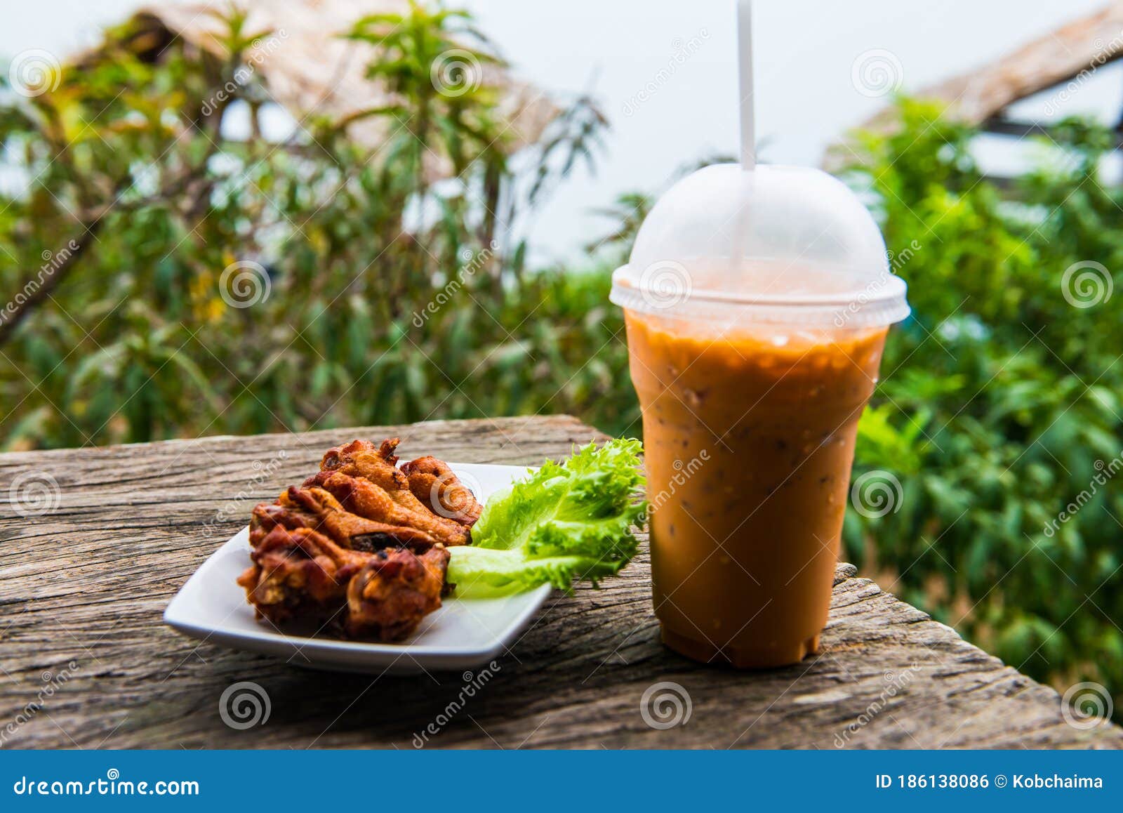 Thai Style Fried Chicken with Iced Milk Tea Stock Photo - Image of ...