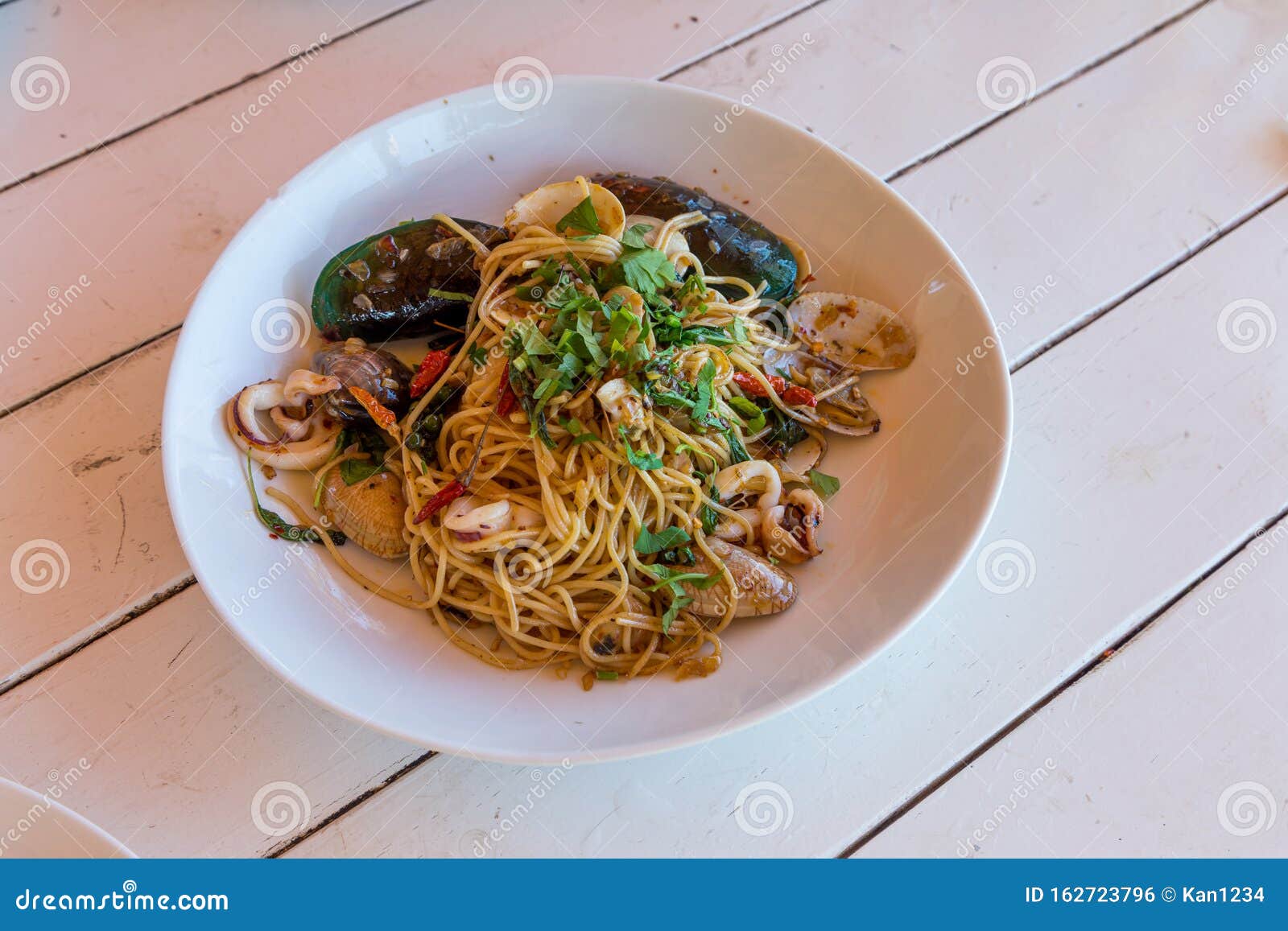 Thai Style Spaghetti with Spicy Seafood Sauce Stock Photo - Image of ...