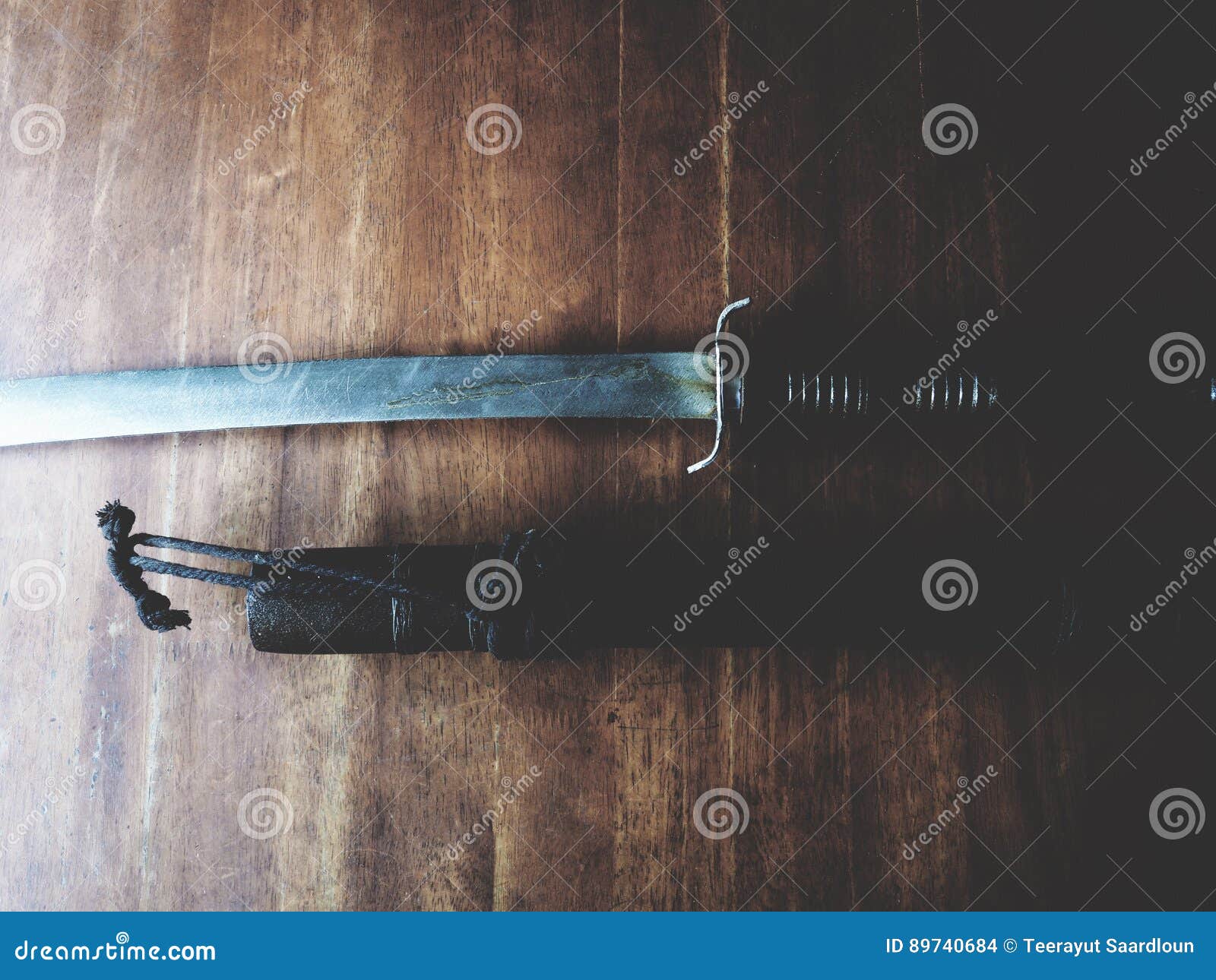 Thai sword on wooden table stock photo. Image of equipment - 89740684