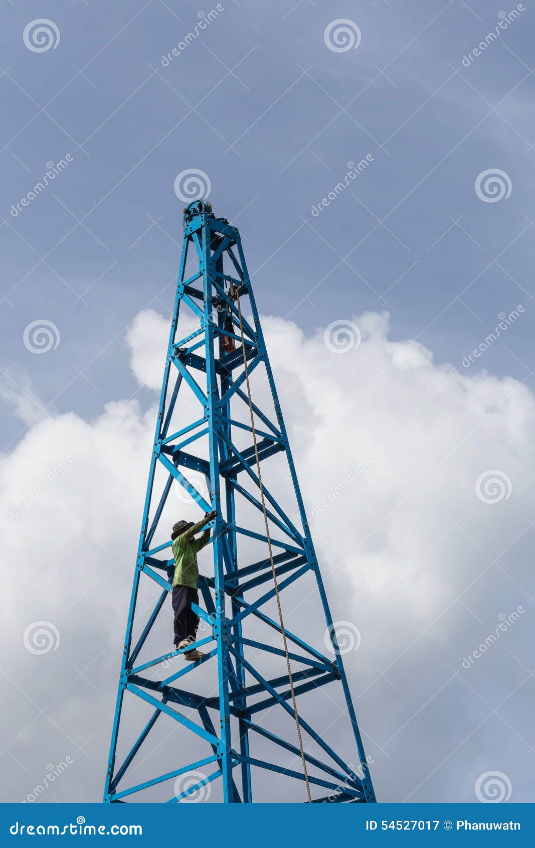 Thai Worker Working on the Blue Construction Crane Stock Image - Image ...