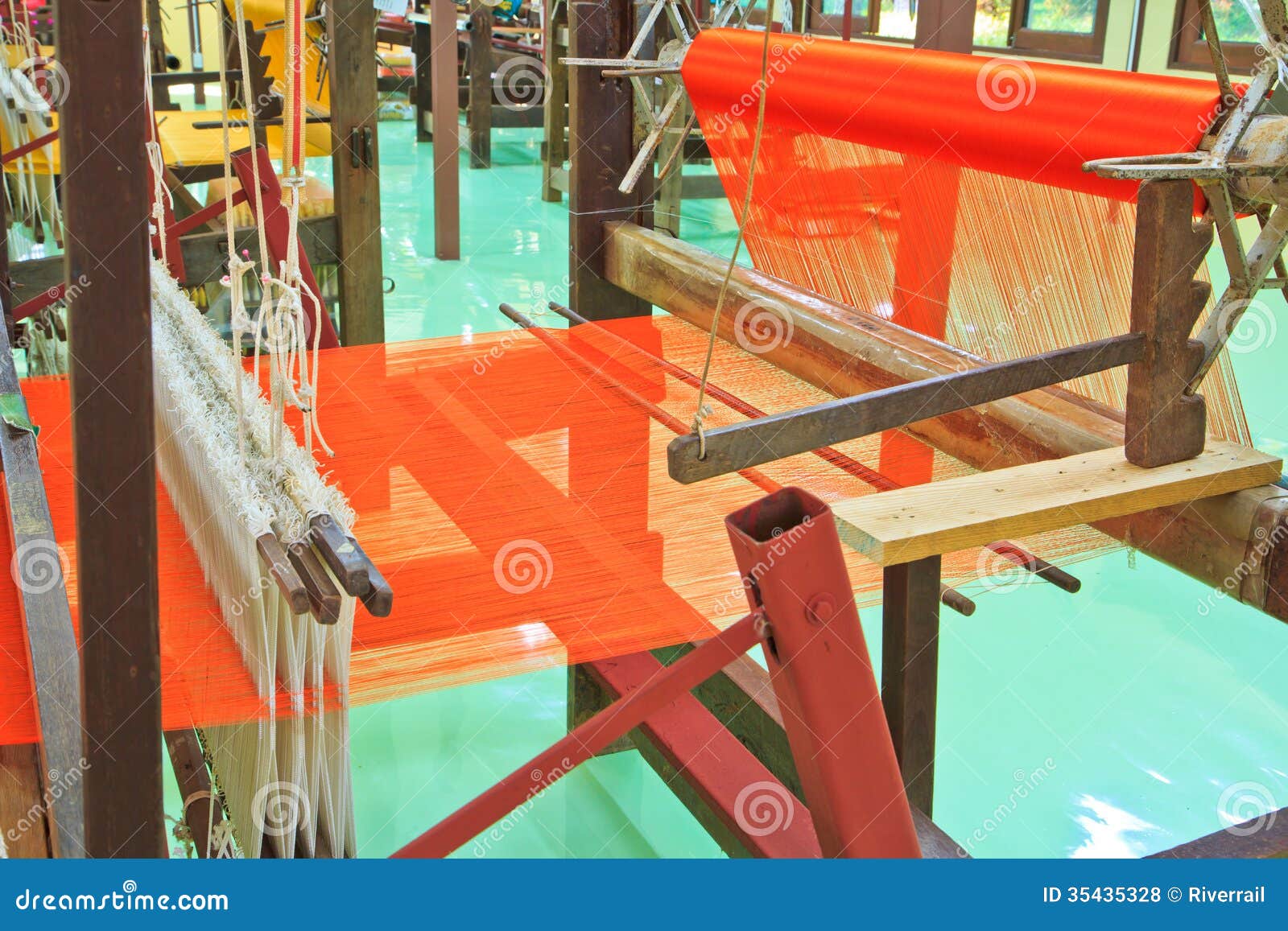 Thai woven silk machine stock photo. Image of cloth, detail - 35435328