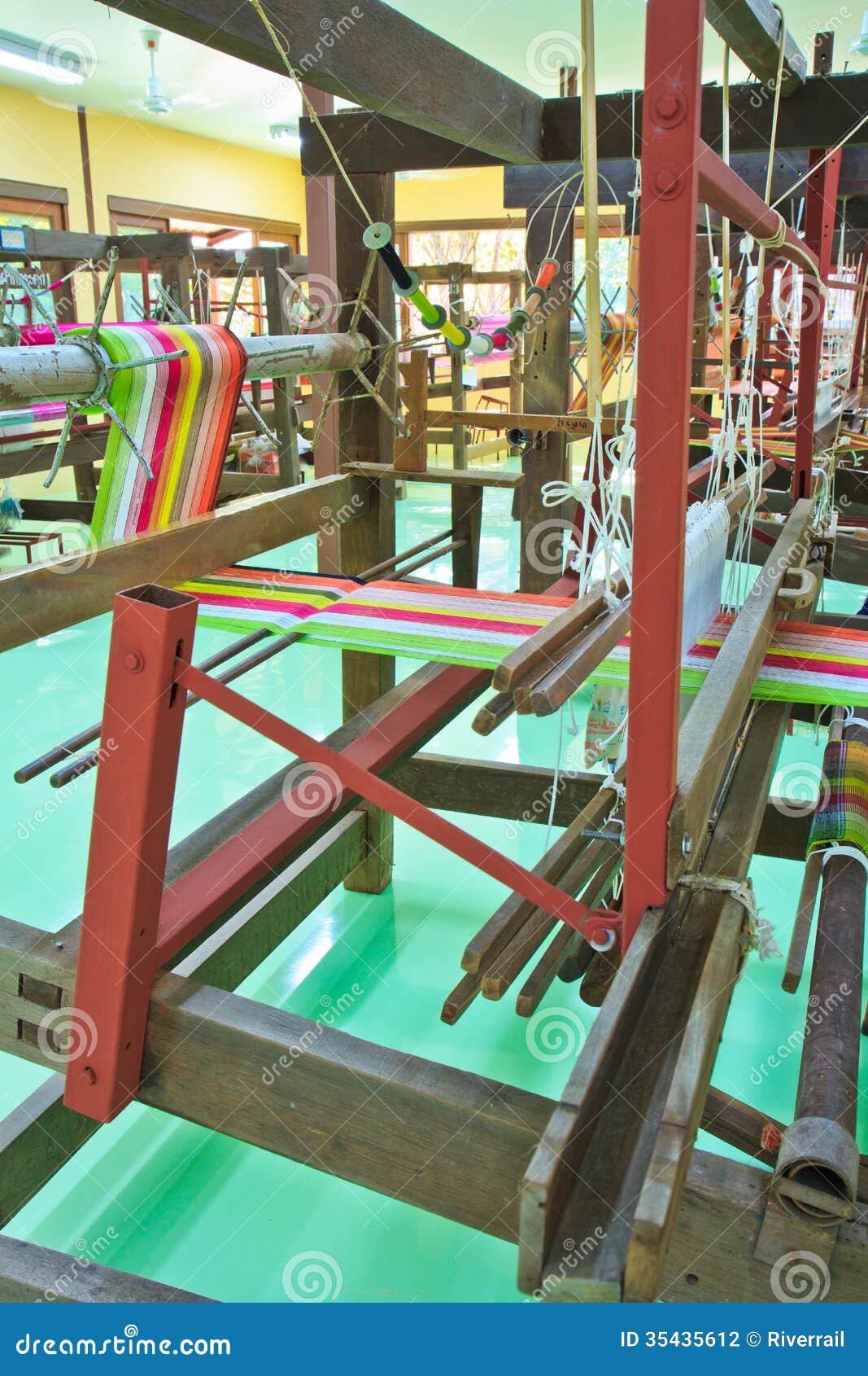 Thai woven silk machine stock photo. Image of material - 35435612