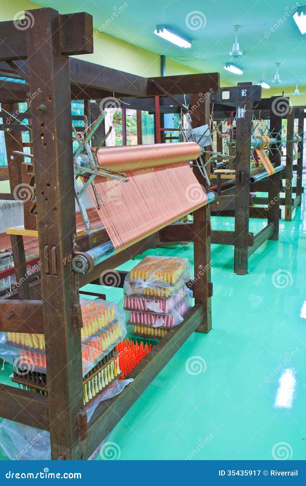 Thai woven silk machine stock image. Image of colorful - 35435917