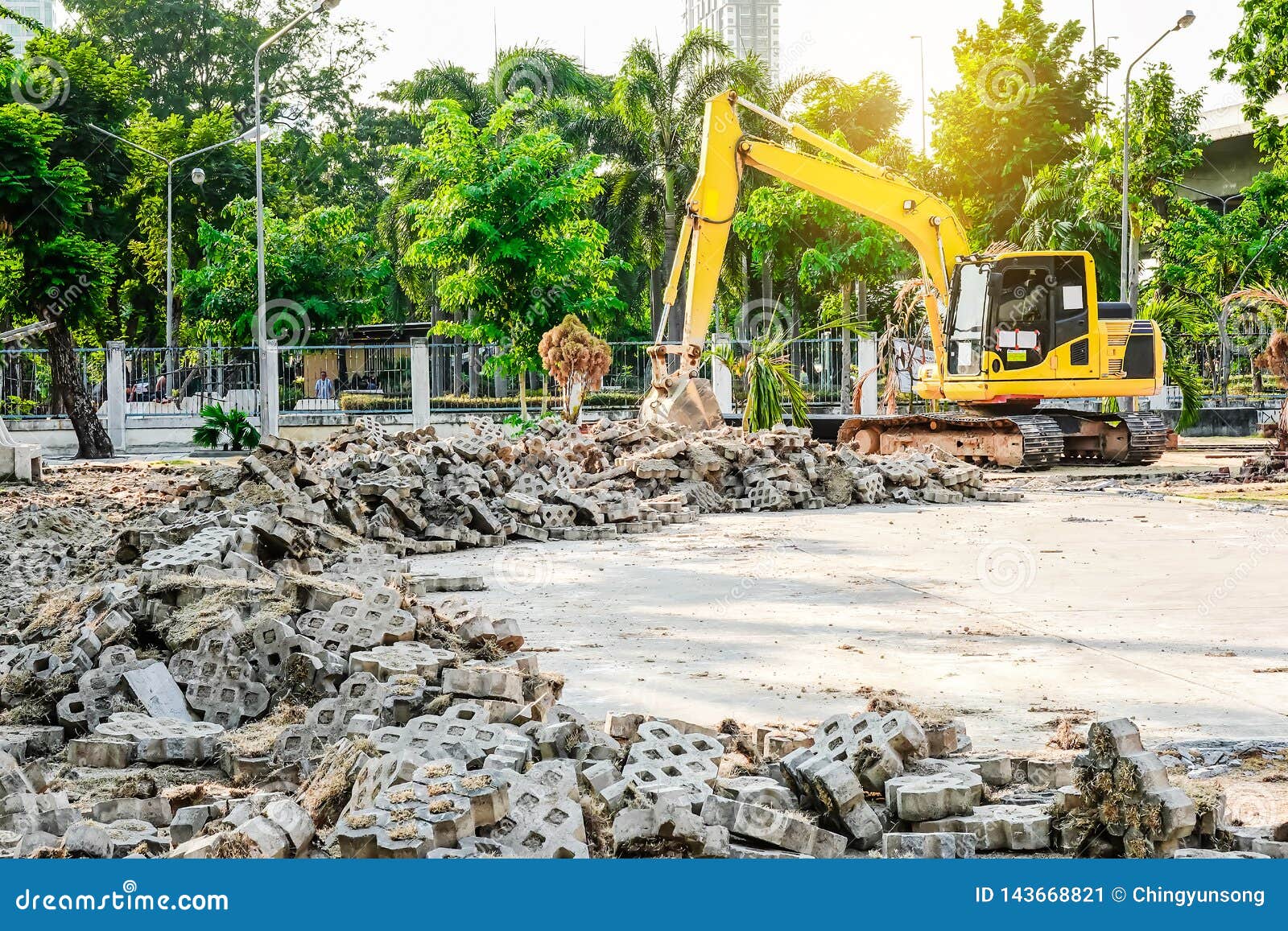 Modern Excavator Performs Excavation Work on the Construction Site ...