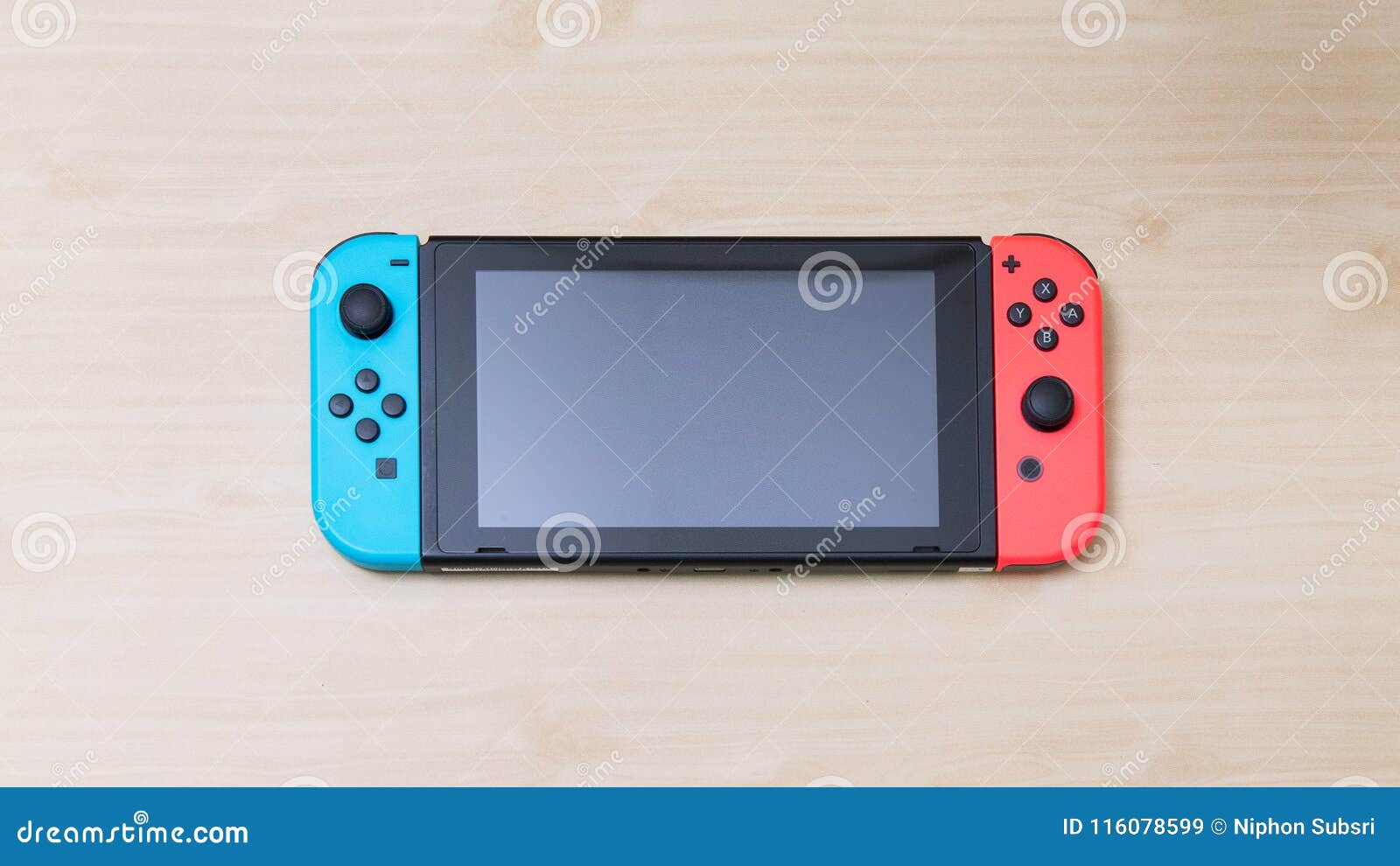 A Nintendo Switch Lite With The Game Animal Crossing New Horizons ...
