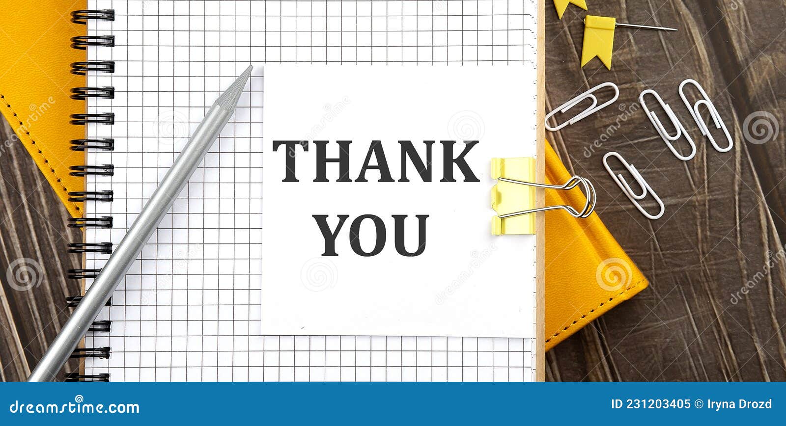 THANK YOU Text on a Sticker on the Notebook, Wooden Background Stock ...