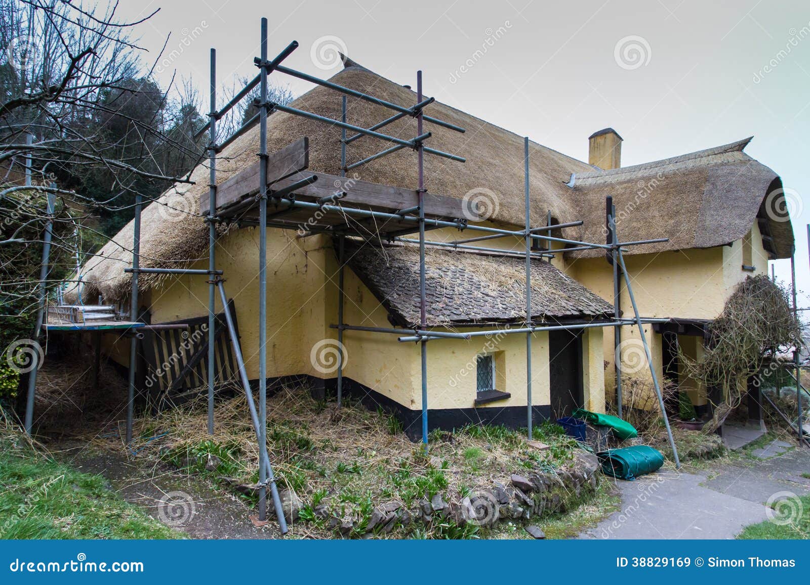 Thatch Roof Repair stock image. Image of english, house - 38829169