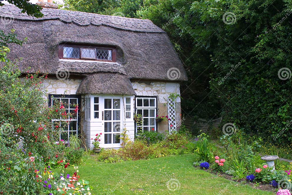 Thatched cottage stock image. Image of charming, house - 26093159