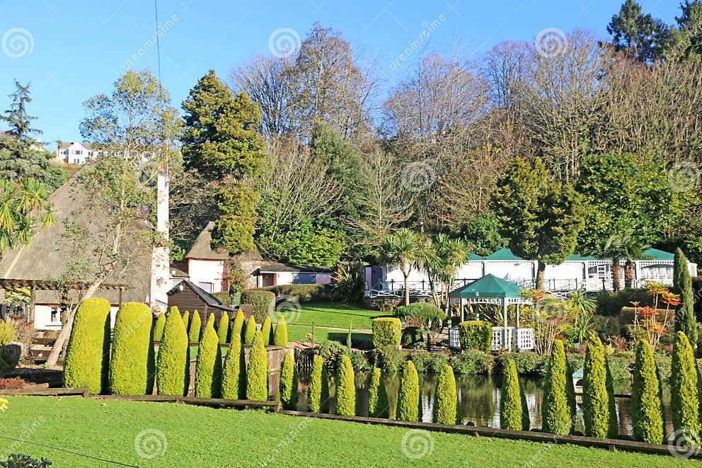 Thatched Cottage and Garden in Cockington, Devon Stock Photo - Image of ... Thatched Cottage and Garden in Cockington, Devon Stock Photo - Image of ...