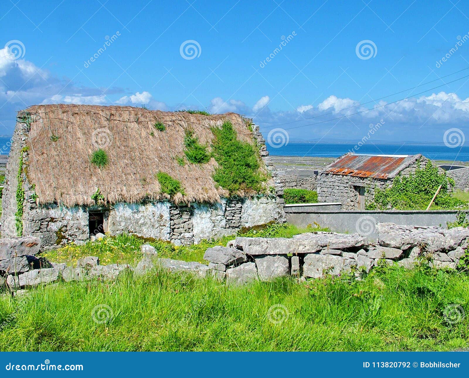 Thatched Cottage on Inis Mor Stock Photo - Image of cloud, island ...
