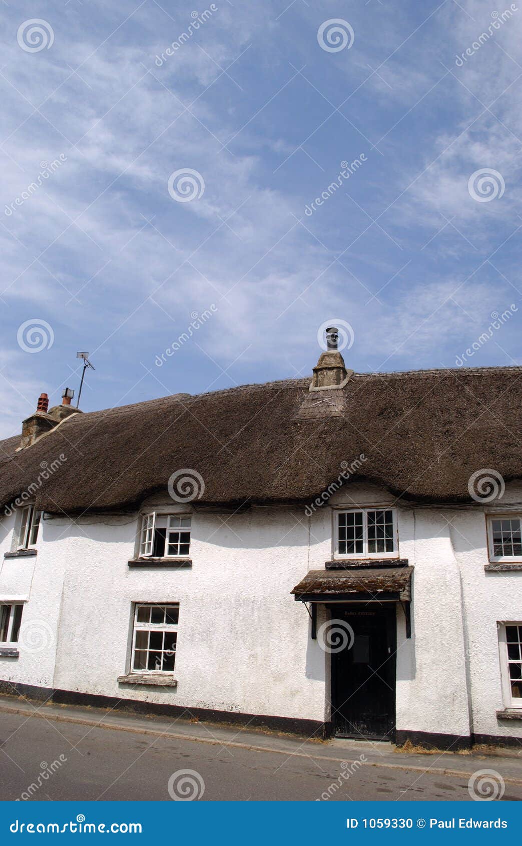 A Thatched House stock photo. Image of thatched, blue - 1059330
