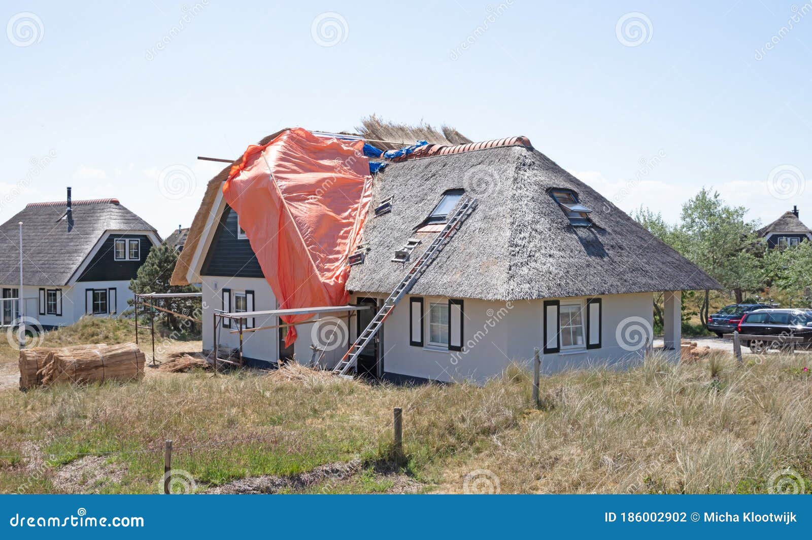 Thatched Roof with Straw and Tools Stock Photo - Image of plastic, roof ...