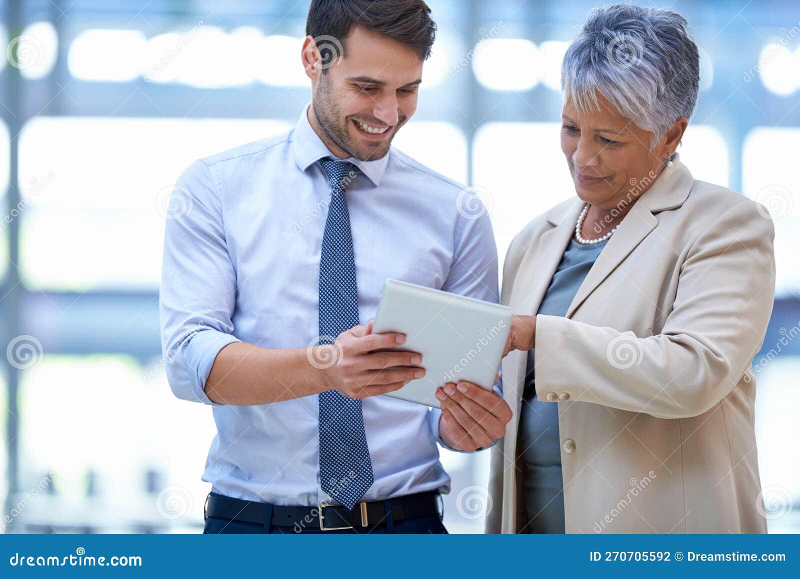Thats Quite Impressive. a Cropped Shot of Two Colleagues Discussing ...